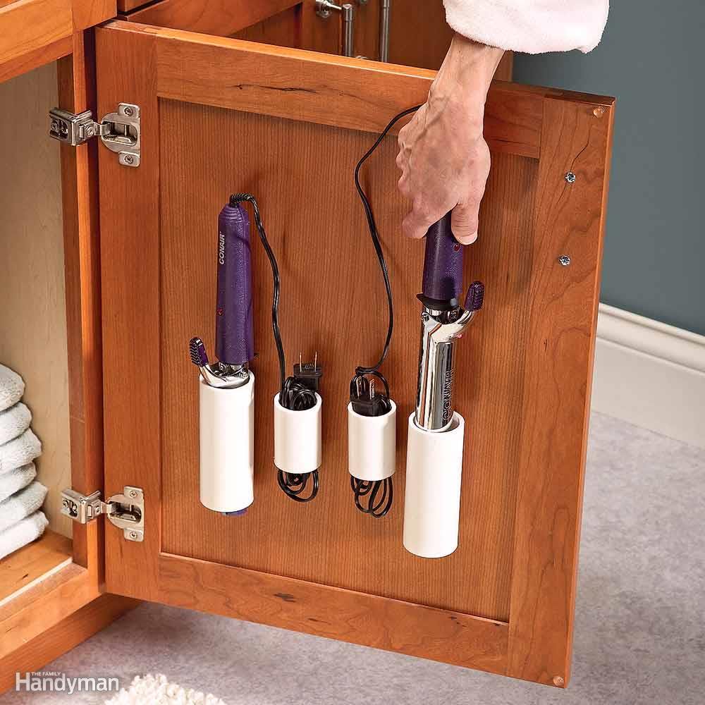 MOM Tip: PVC Pipe Holsters Inside Cabinets - 24/7 Moms