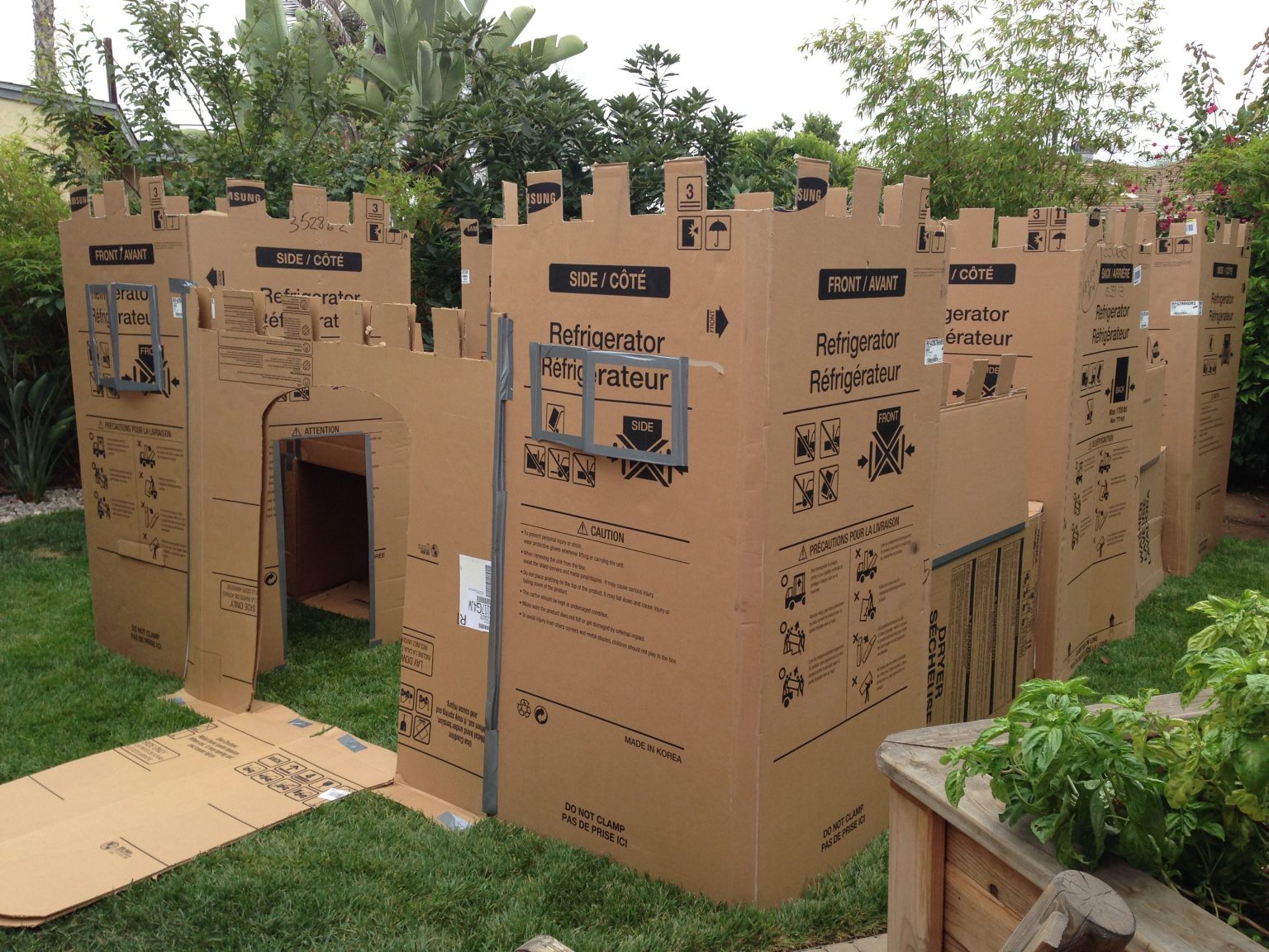 Day 42 - MEGA Cardboard Forts {100 Days of Summer Fun} - 24/7 Moms